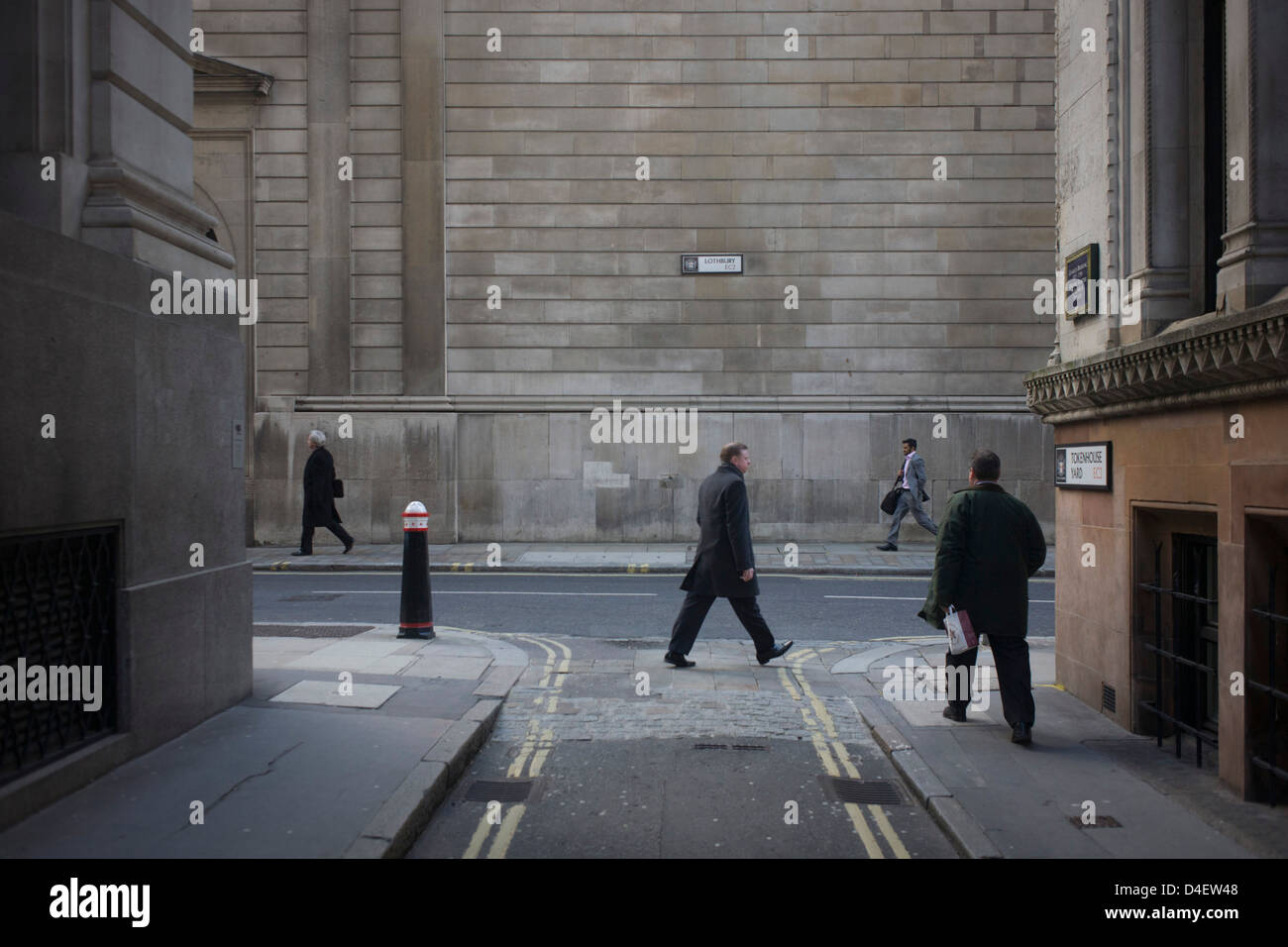 Lunchtime pedestrians on the corner of Lothbury and Tokenhouse Yard ...