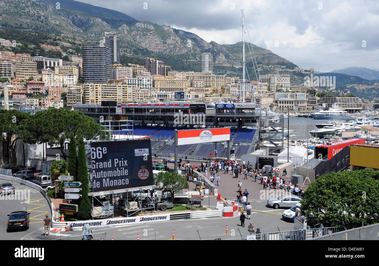 Tourists and cars are pictured on the race track for the Formula One ...