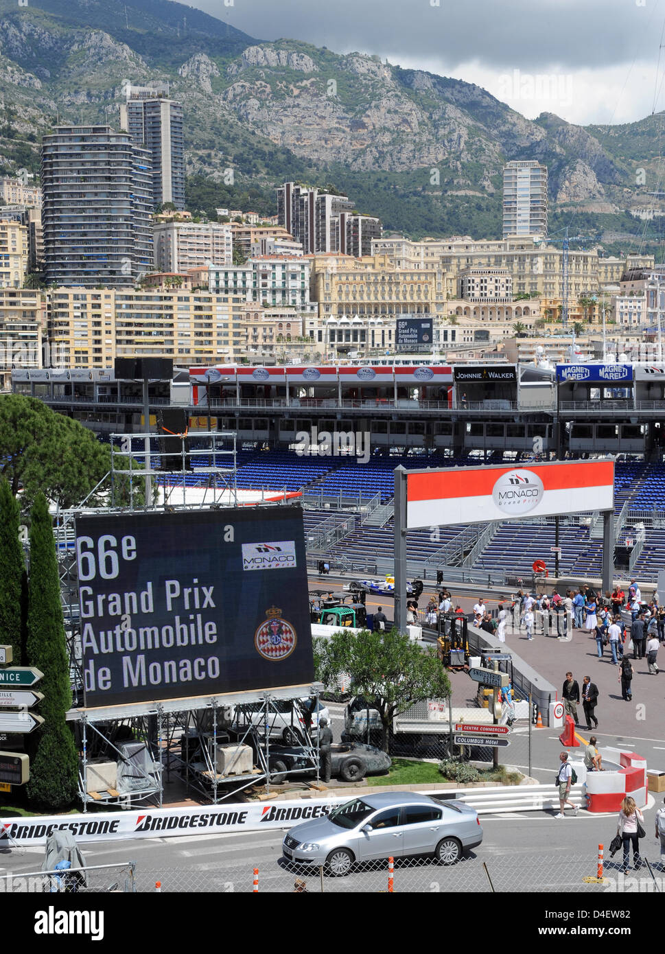 Tourists and cars are pictured on the race track for the Formula One ...