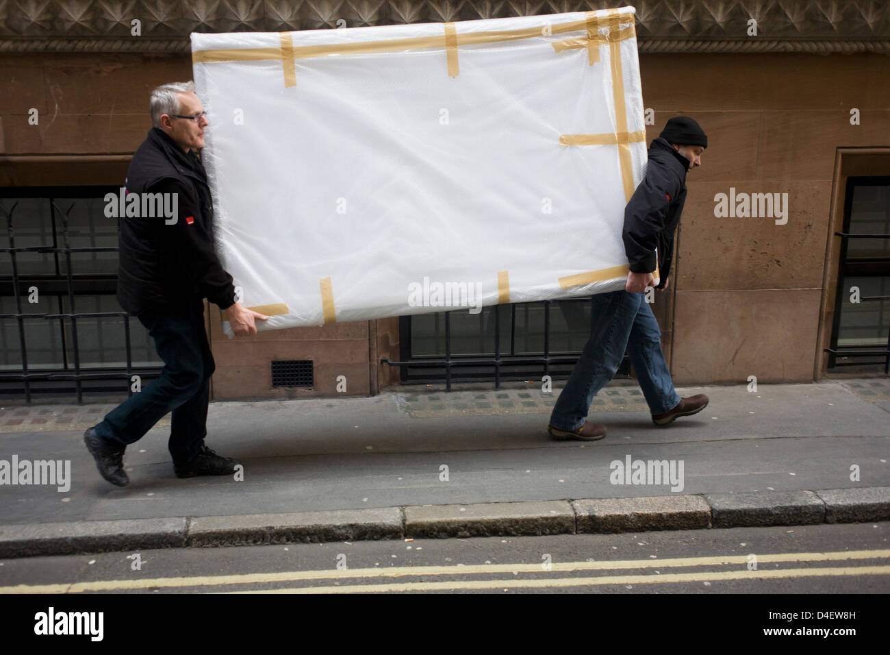 Workmen carrying art hi-res stock photography and images - Alamy