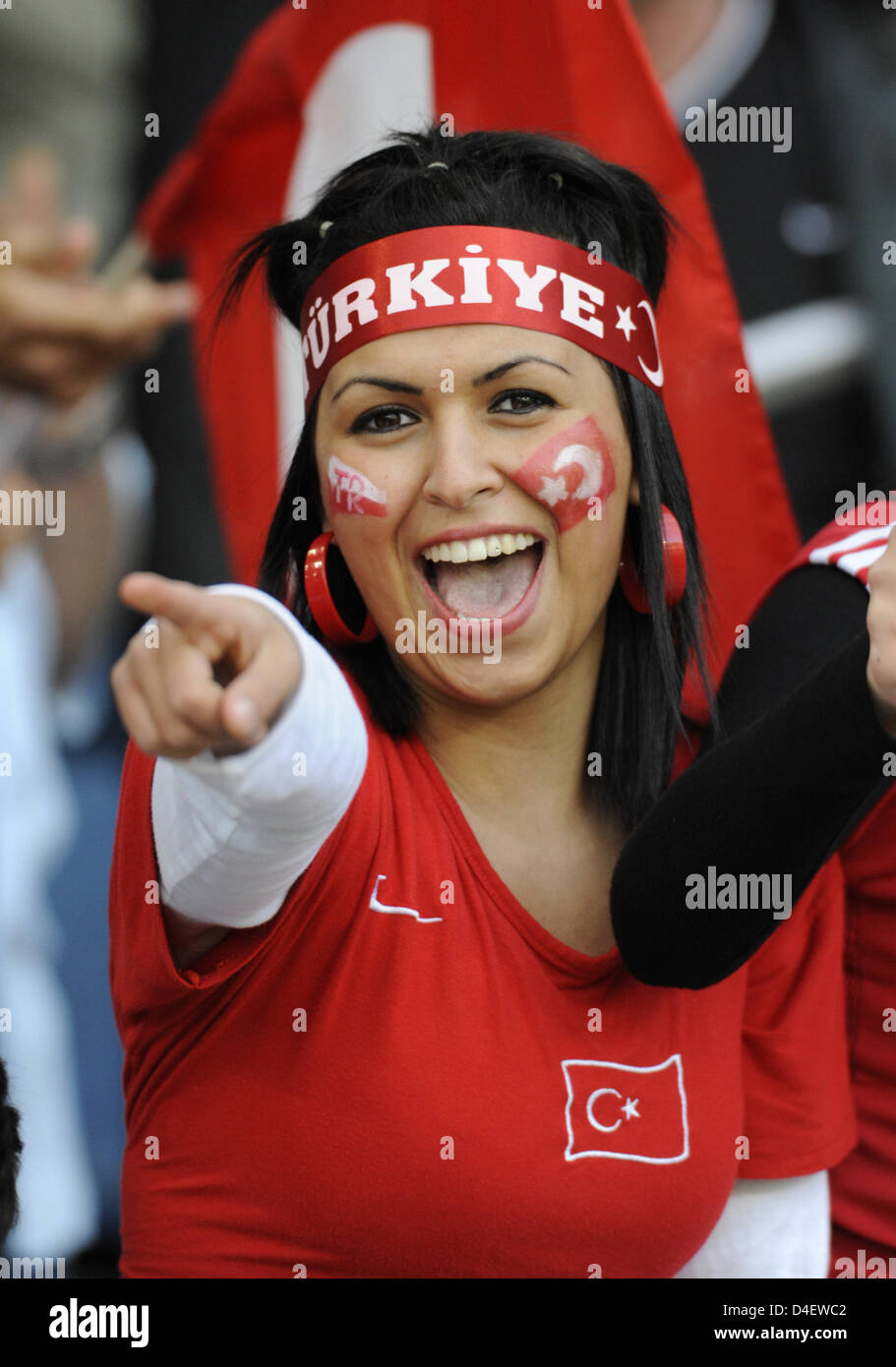A female fan gestures enthusiastically during the international match ...