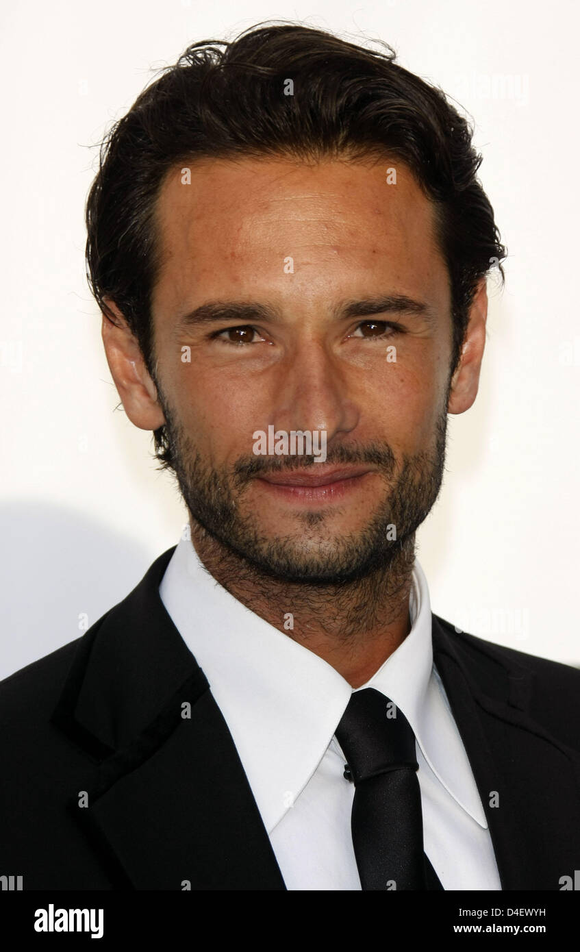 Actor Rodrigo Santoro arrives at the amfAR Cinema Against Aids Gala at ...