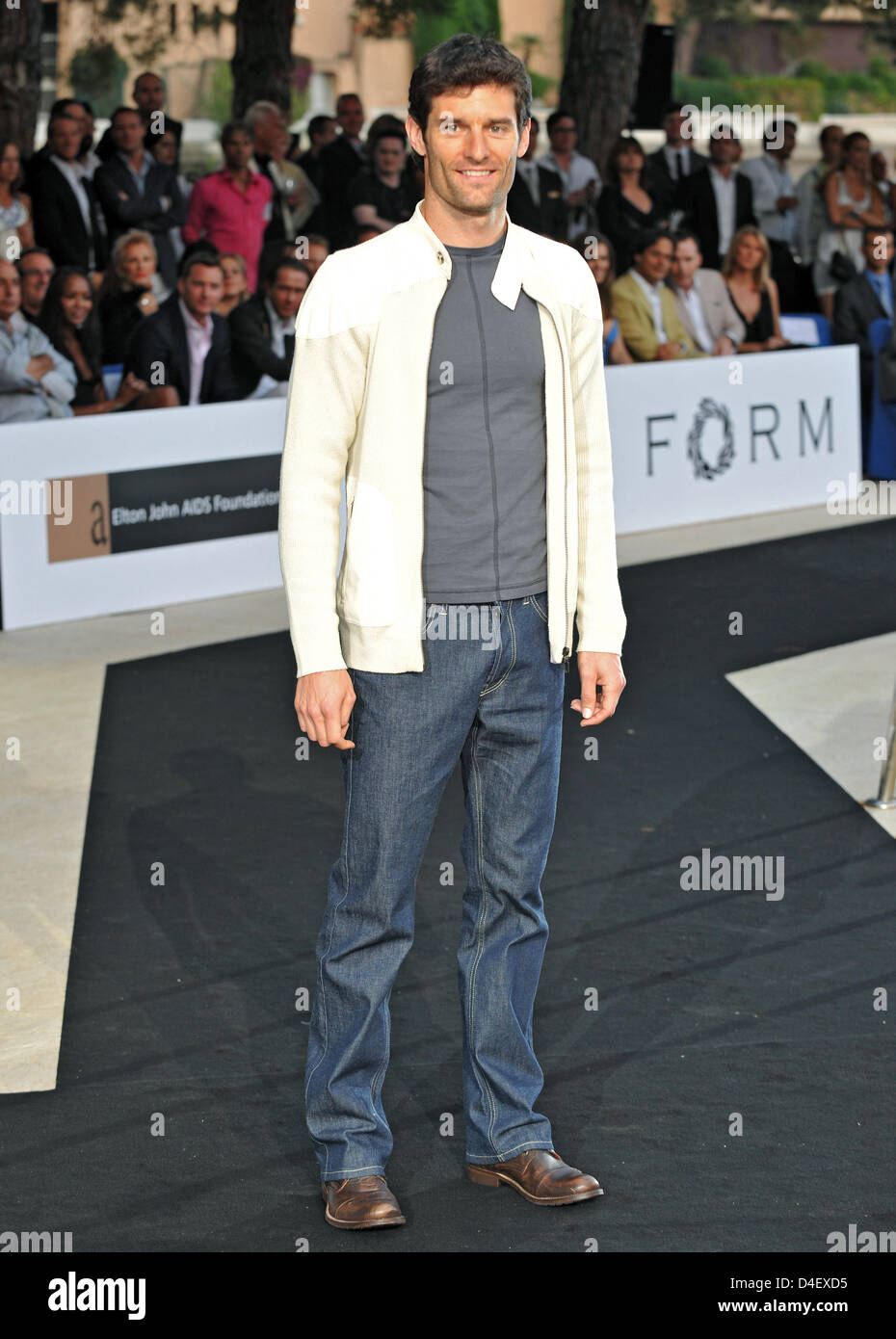 Australian Formula One driver Mark Webber of Red Bull Racing presents ...