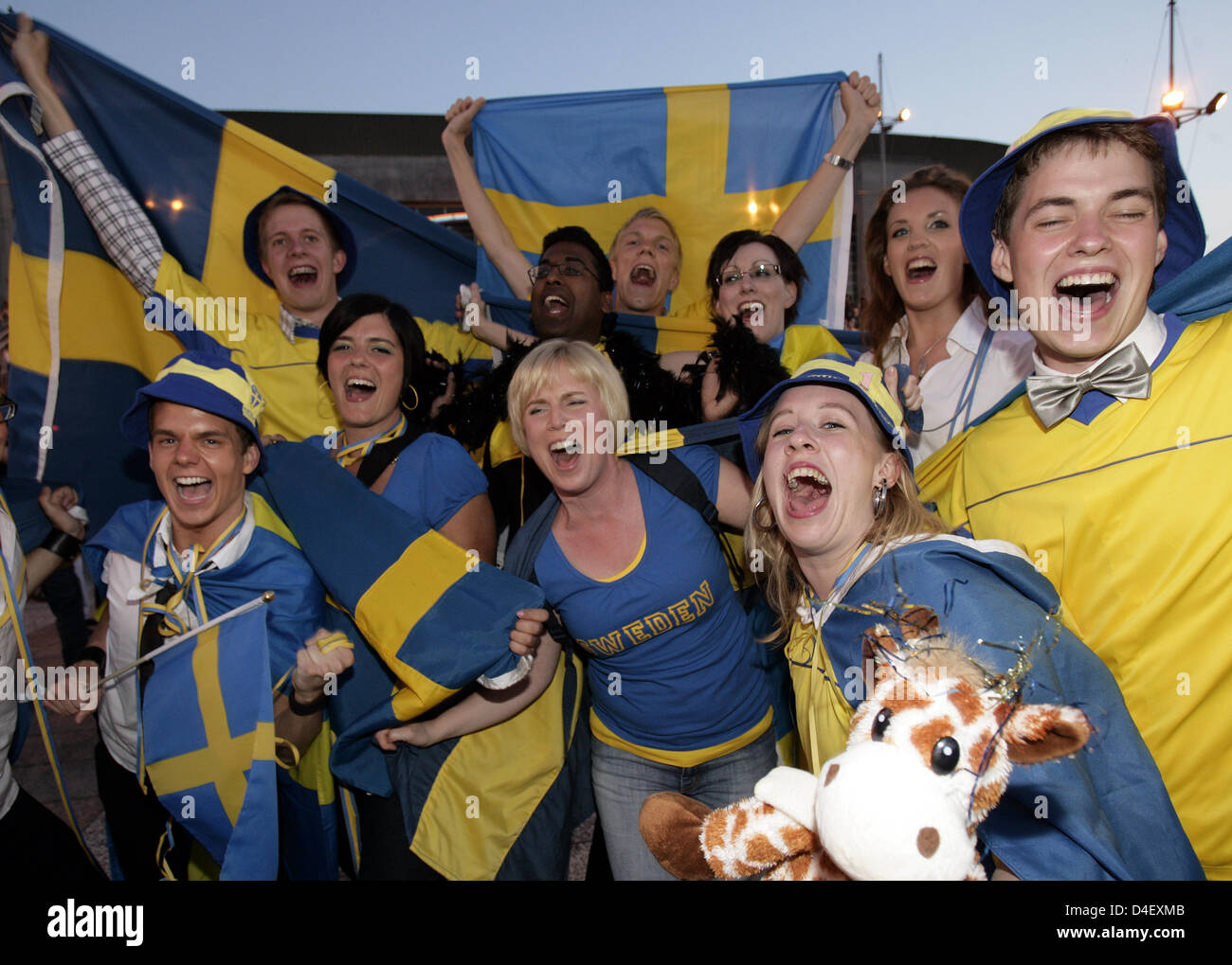 Swedish music fans are pictured before the finale of the Eurovision ...