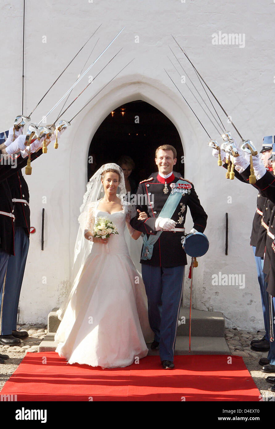 Prince Joachim of Denmark (R) and wife Princess Marie (L) merrily leave ...
