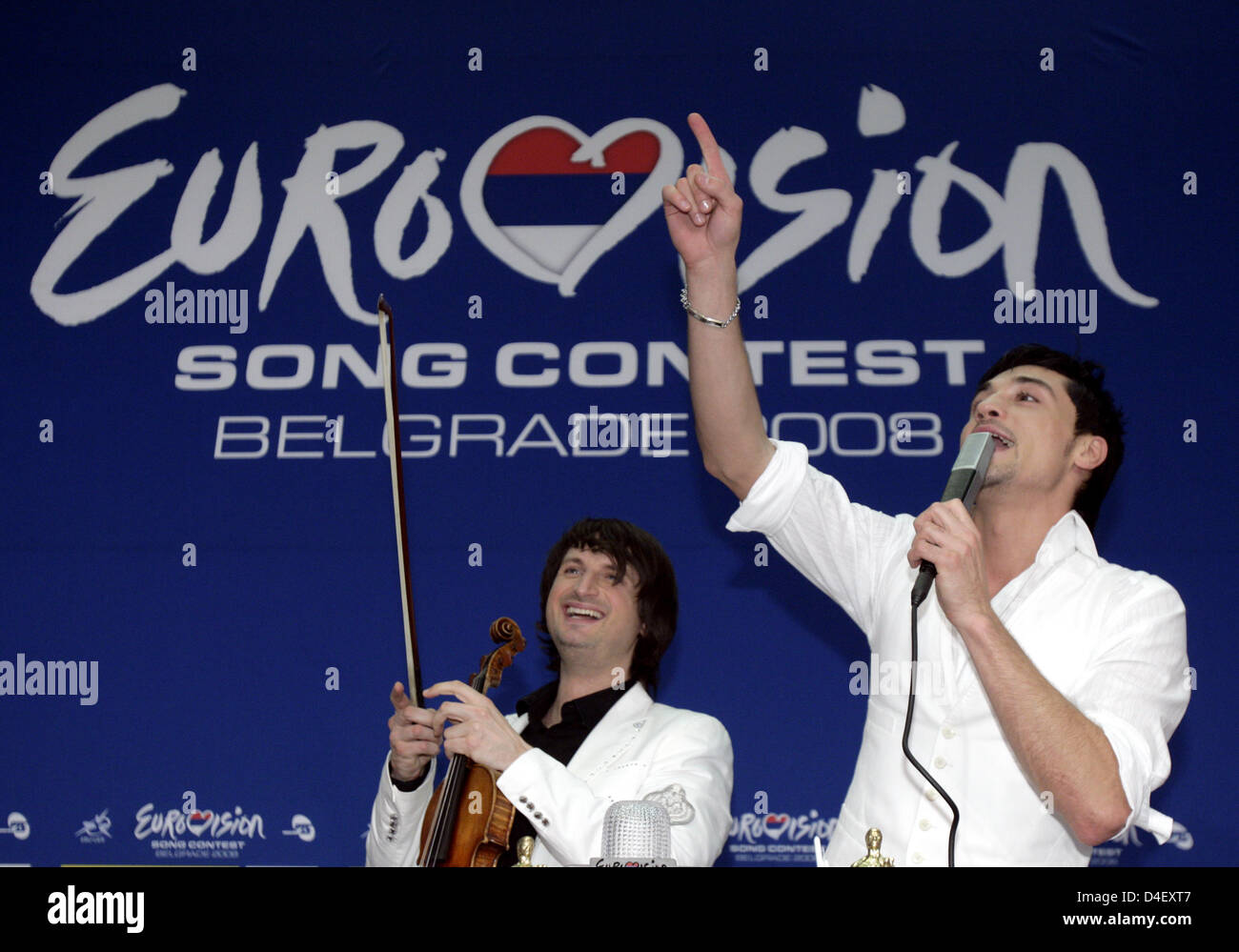 Russian singer Dima Bilan (R) cheers winning the Eurovision Song ...