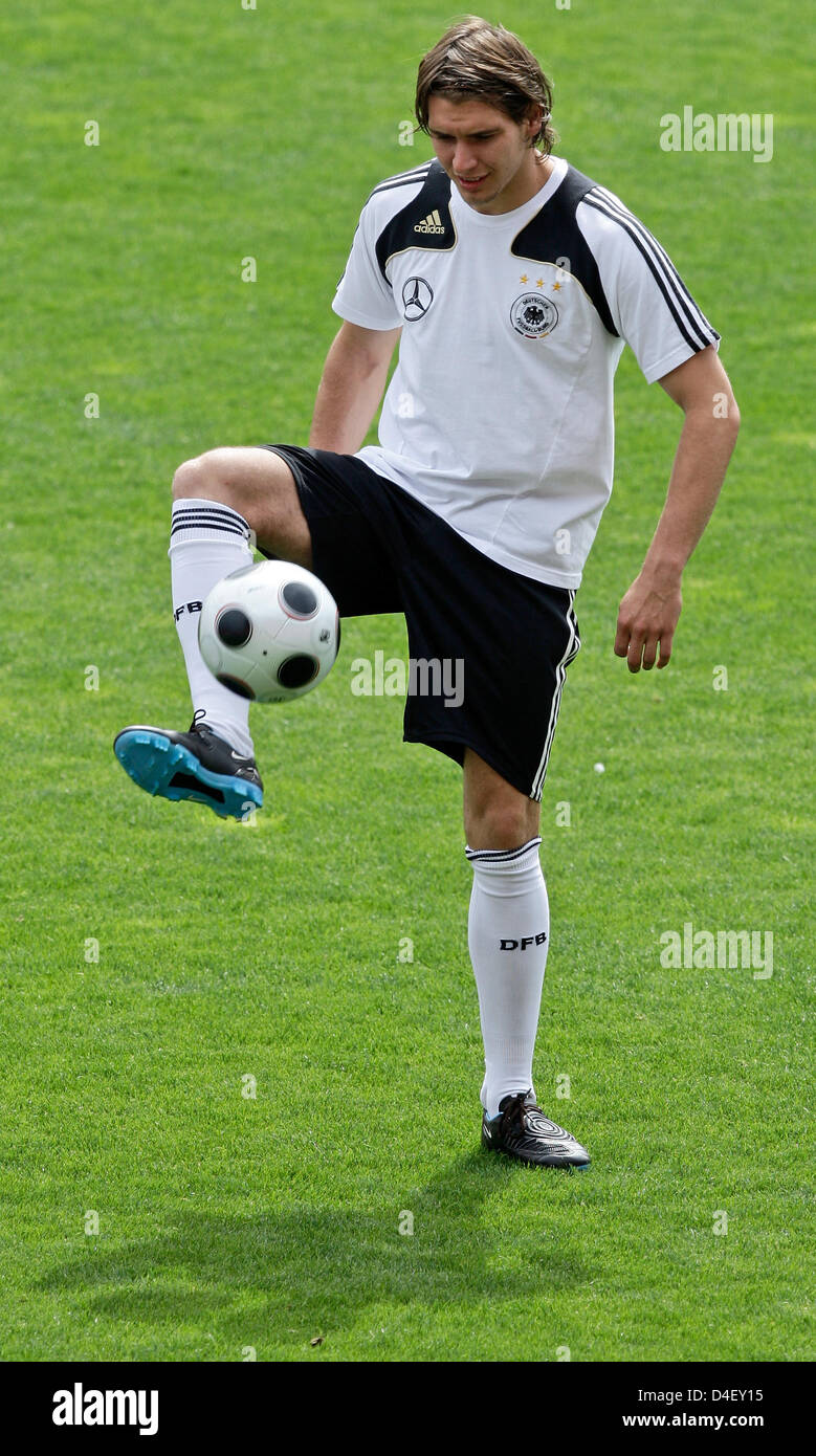 German international striker Patrick Helmes controls the ball during ...