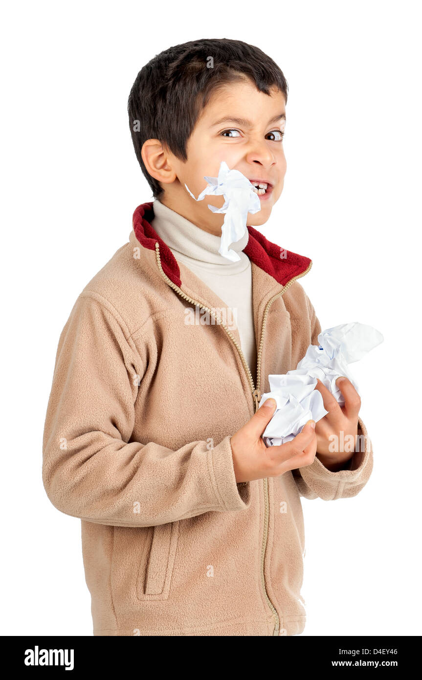 Stressed young boy chewing his homework Stock Photo - Alamy
