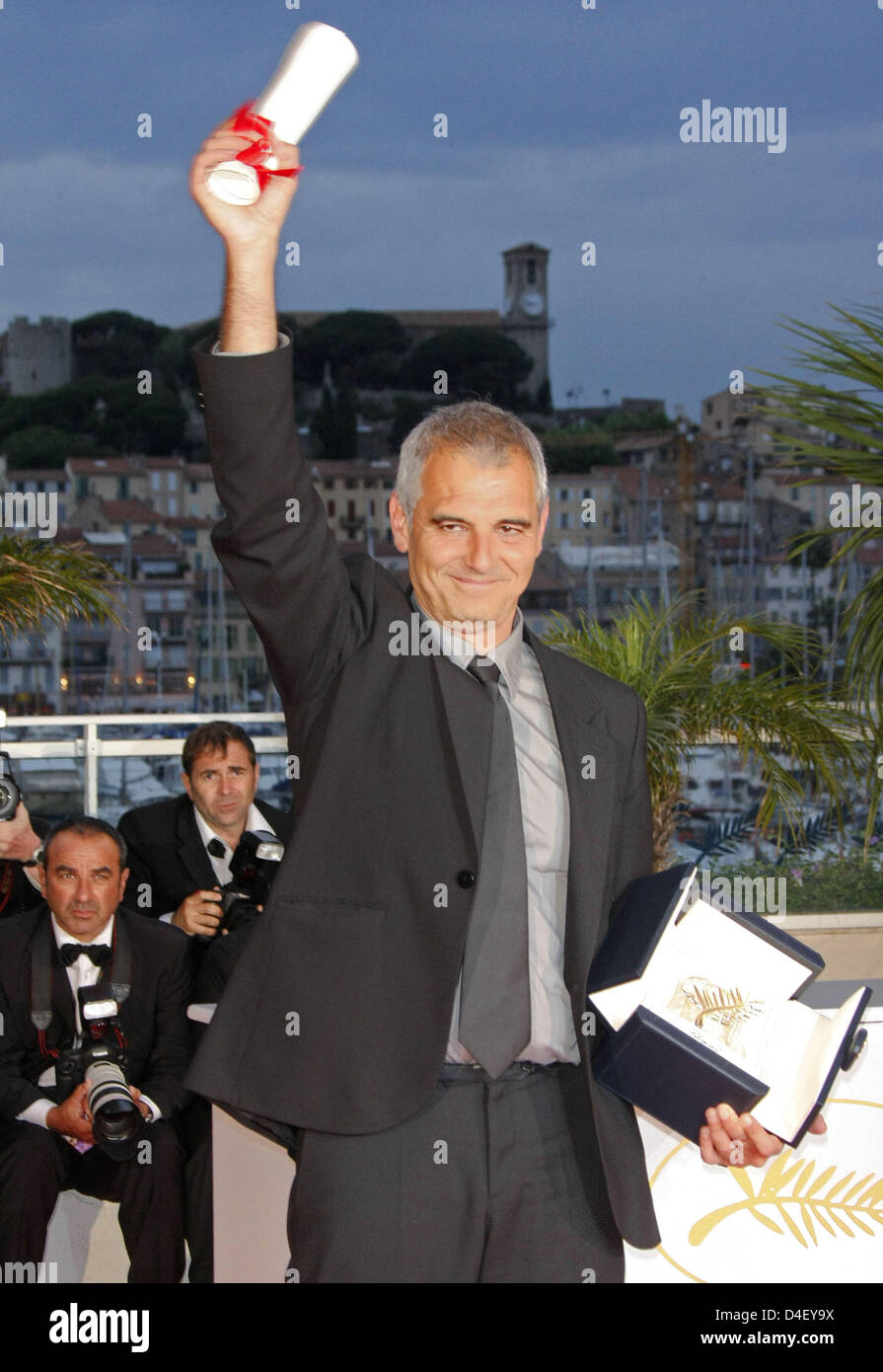 French filmmaker Laurent Cantet smiles with his Palme d'Or for his film ...