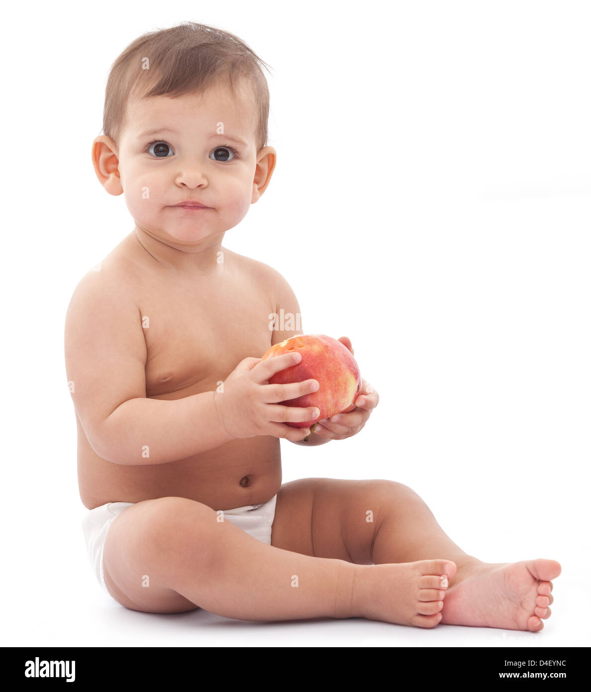 Confused kid with apple hi-res stock photography and images - Alamy