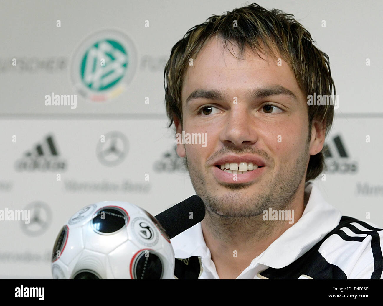 German national player Heiko Westermann sits on the podium during a ...