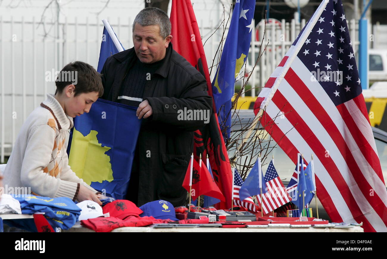 A child sells flags at a street in Pristina, Kosovo, 06 April 2008 ...