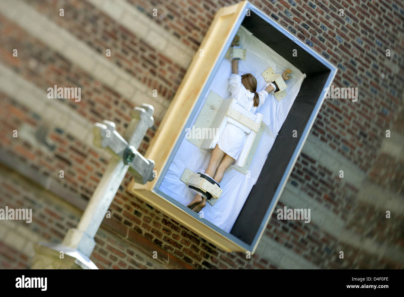 A crucified woman is presented at a wall of the Catholic Alt Sankt ...
