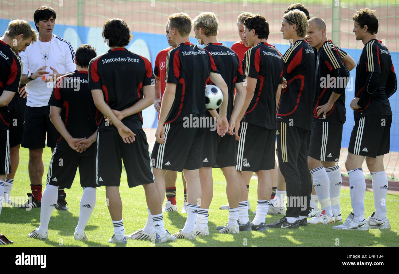 German national squad head coach Joachim Loew (C, white shirt) talks to ...