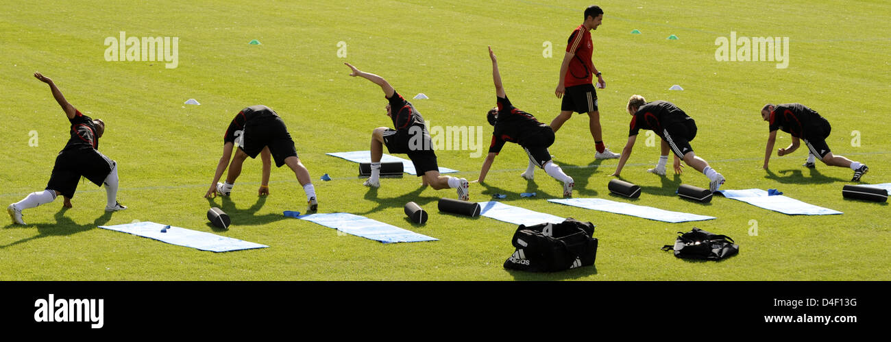 Germany's players perform an exercise during a first training session ...