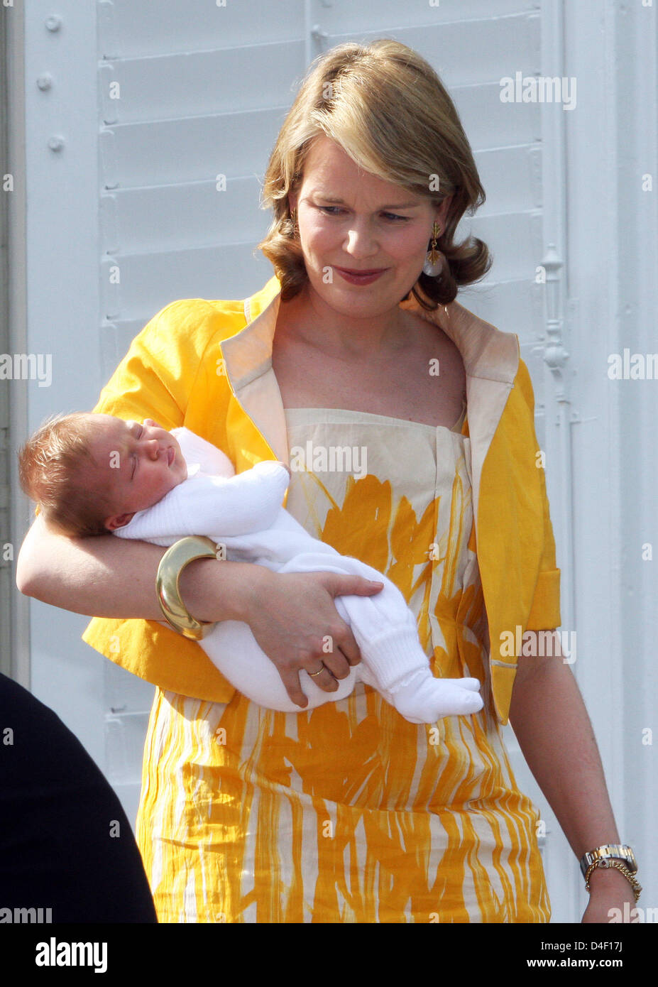 Princess Mathilde holds her daughter Princess Eleonore during the ...