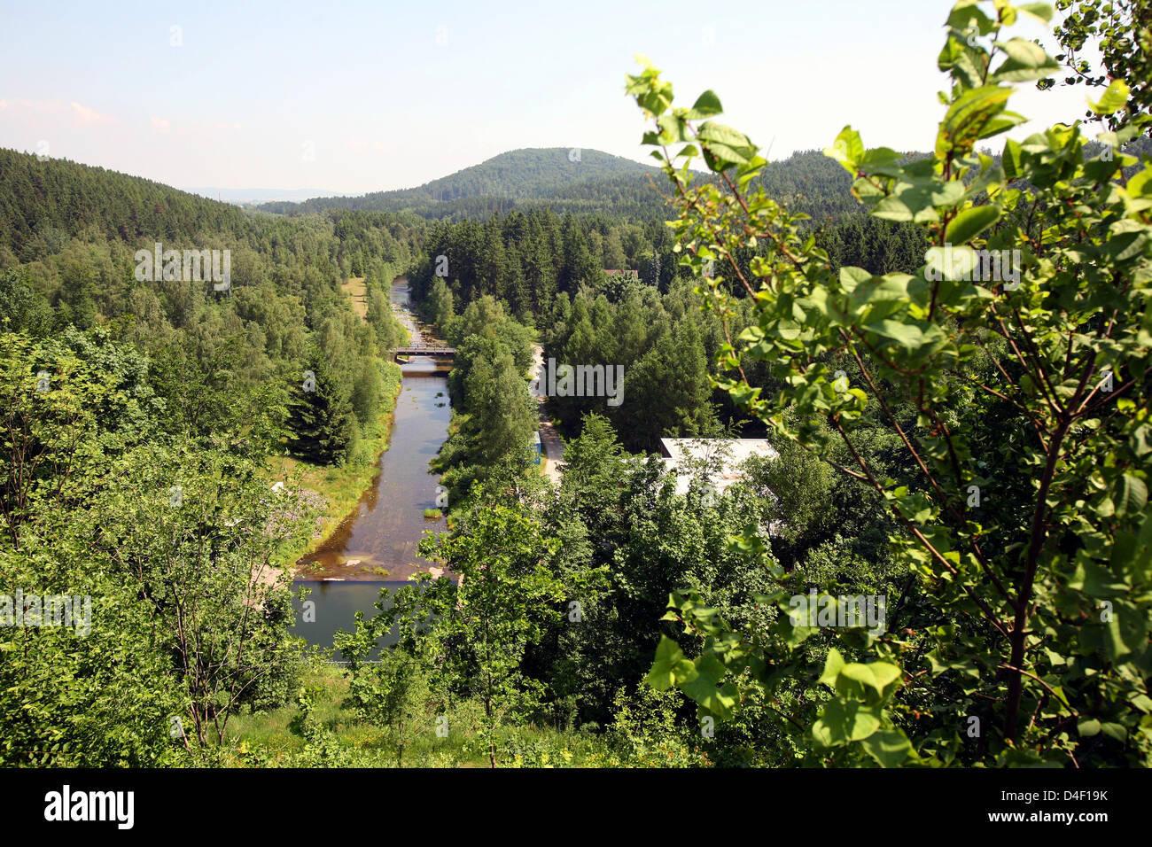 Overfall of Innerste river dam pictured at mountain range Harz near ...