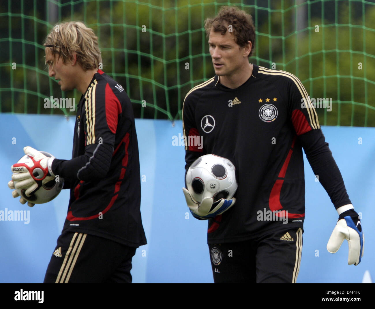 Goalkeepers of the German national soccer squad, Jens Lehmann (R) and ...
