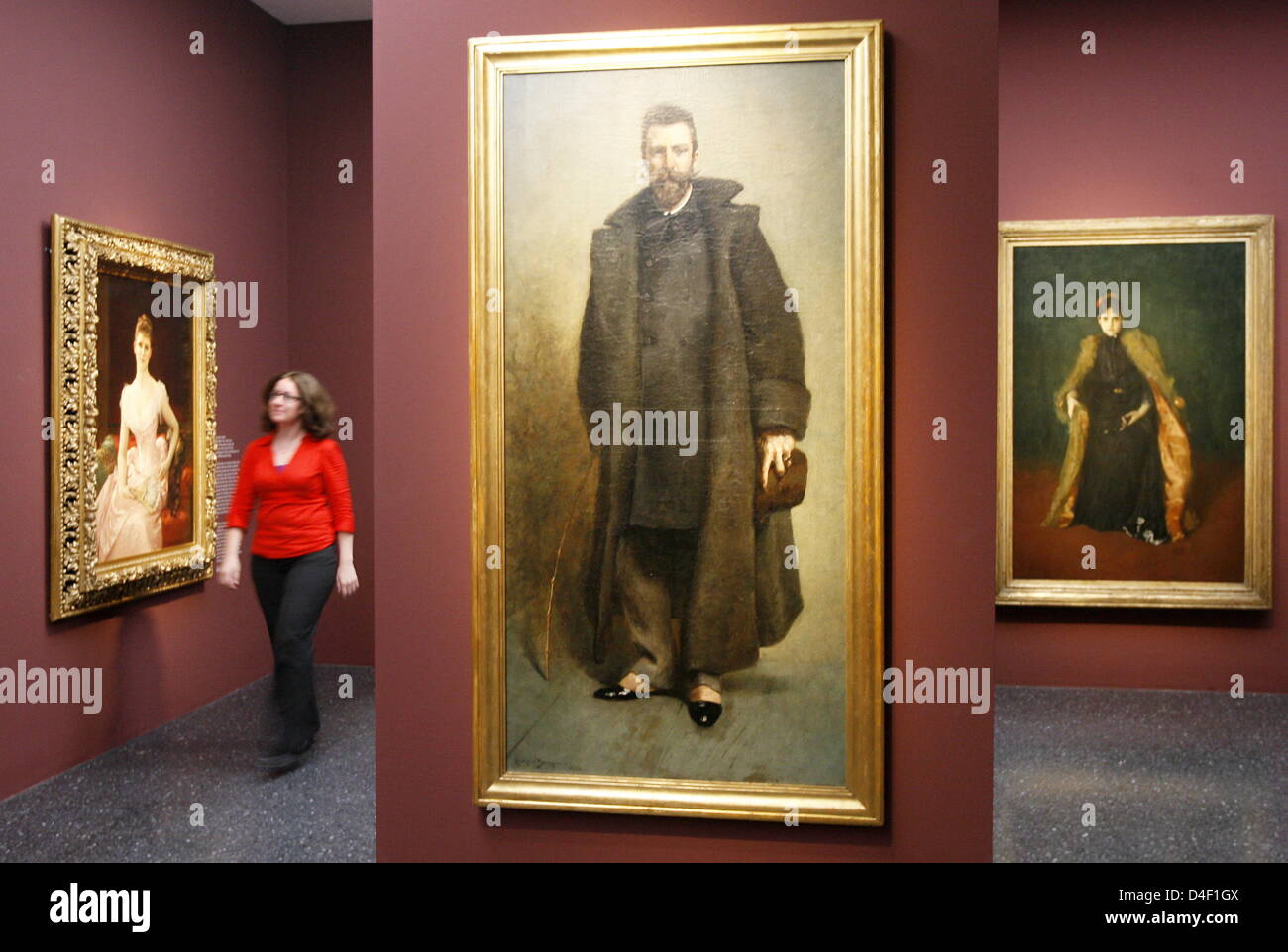 Visitors eye paintings in the exhibition 'High Society - American ...