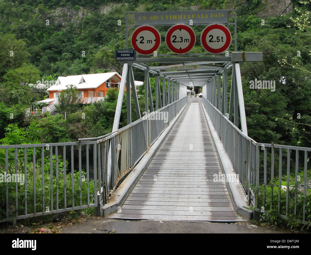 A suspension bridge built in 1893 pictured near St. Anne on Reunion ...