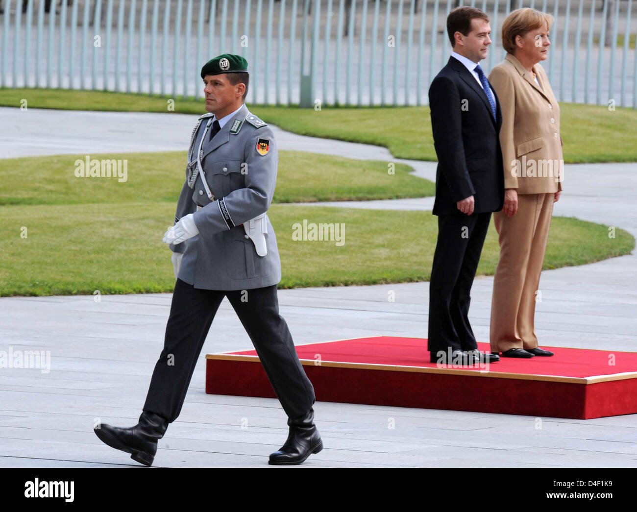 German Chancellor Angela Merkel (R) welcomes Russian President Dmitry ...