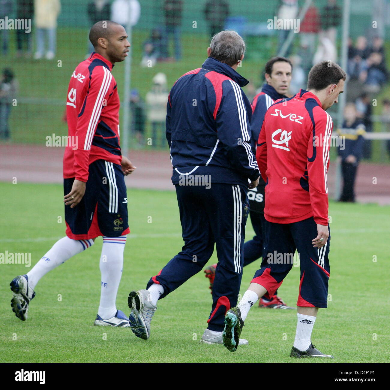 (L-R) French international striker Thirerry Henry, team doctor Jean ...