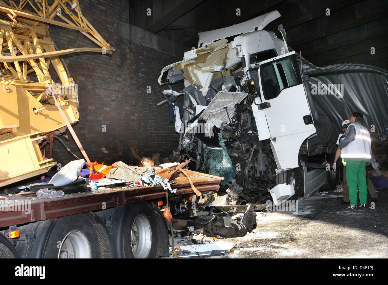 View on the scene of accident where lorries have heavily crashed on ...