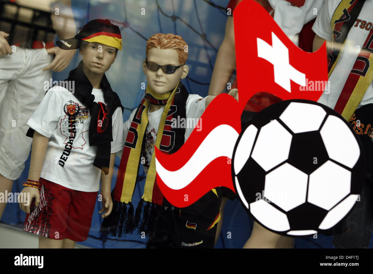 A shop-window displays fan merchandise of the German national squad in ...