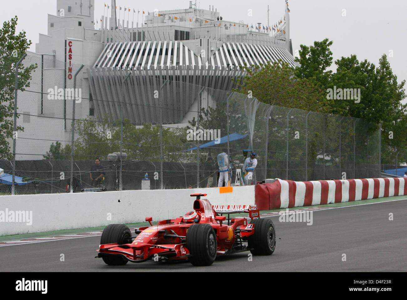 Finnish Formula One driver Kimi Raikkonen of Ferrari steers his car in ...