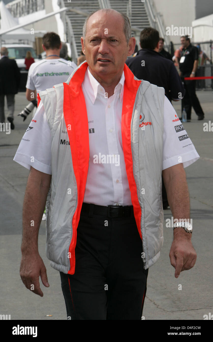 British Ron Dennis; team principal of McLaren Mercedes walks through ...