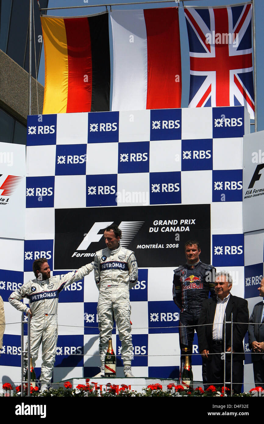 Polish Formula One driver Robert Kubica (C) of BMW Sauber, with German ...