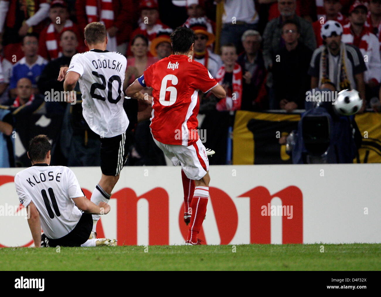 Lukas Podolski (20) of Germany scores the 2:0, left his teammate ...