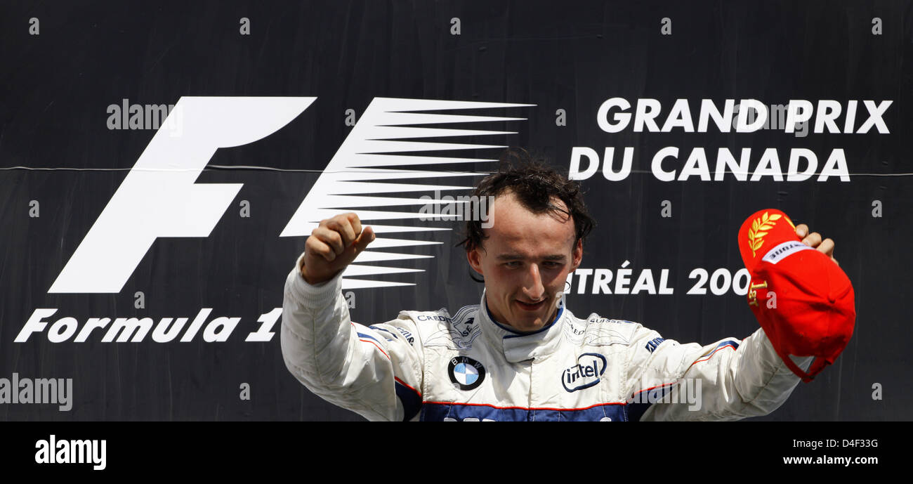 Polish Formula One driver Robert Kubica of BMW Sauber celebrates on the ...