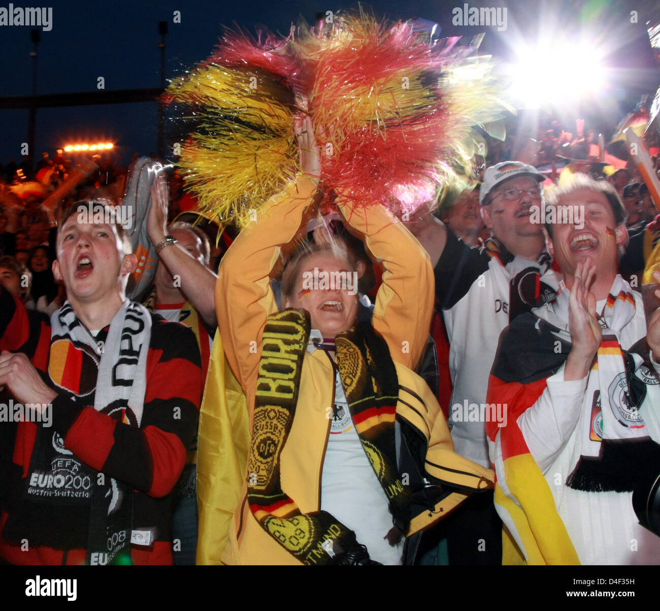 German football fans celebrate during the European Championship match ...
