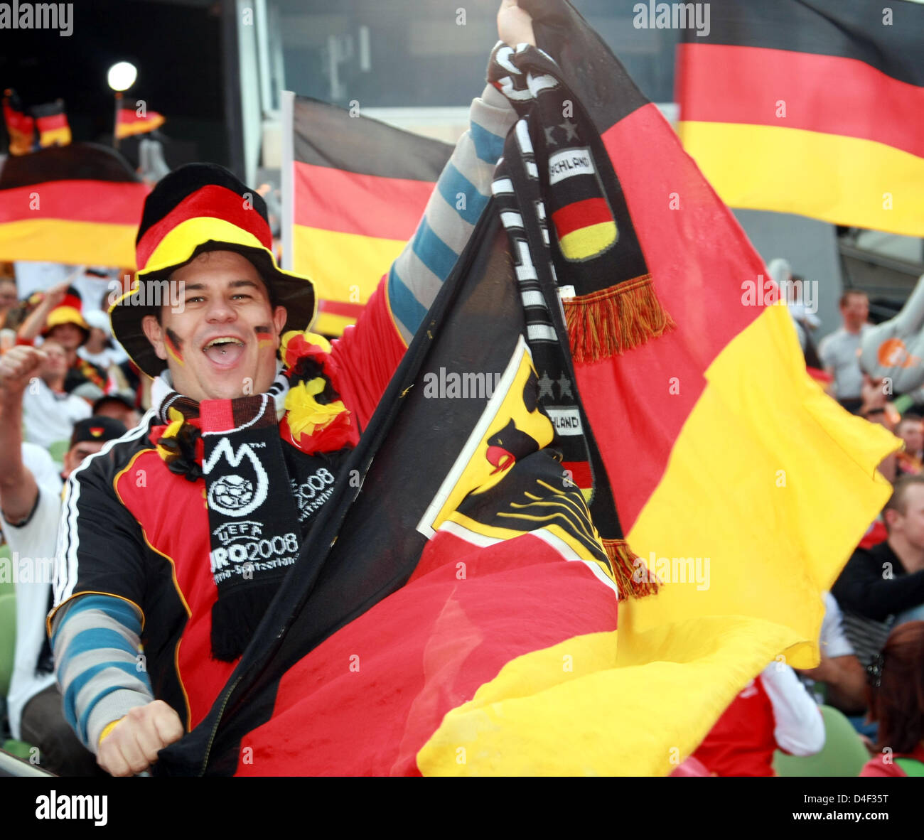 German football fans celebrate during the European Championship match ...