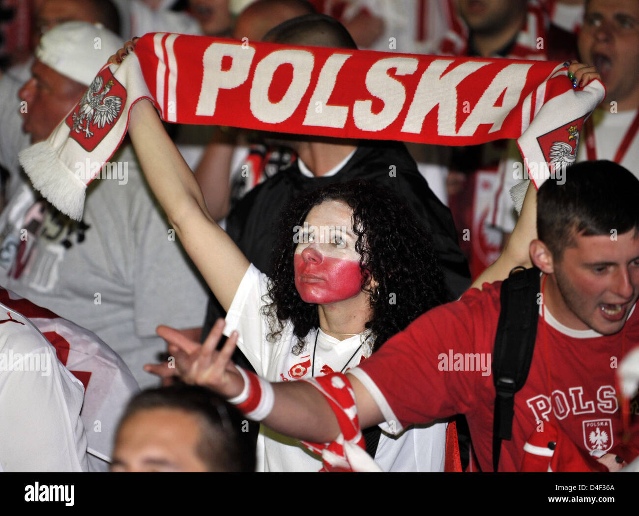 Sad Polish fans are pictured during the first Euro 2008 Group B match ...