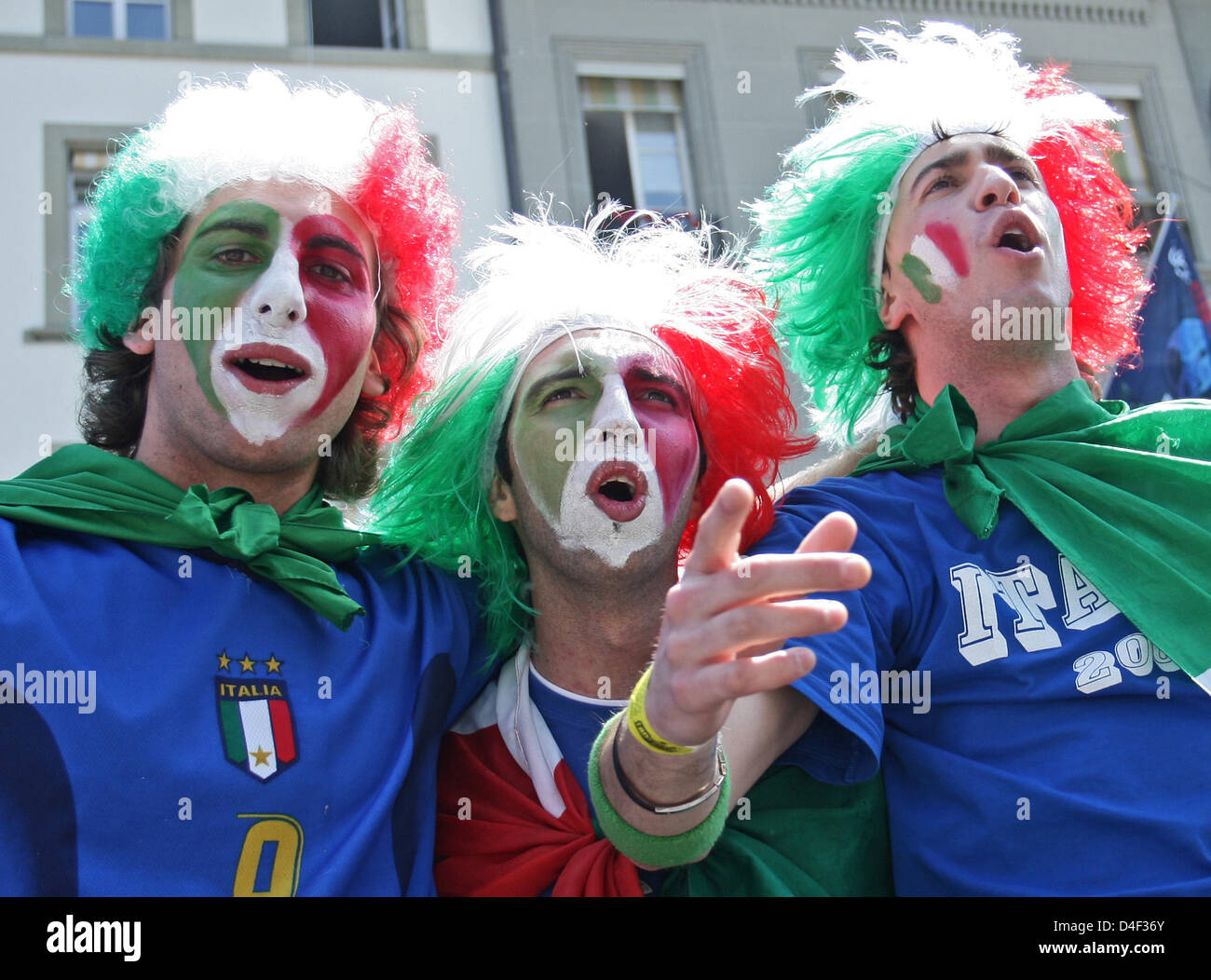 Supporter of the Italian soccer team celebrate in downtown Berne prior ...