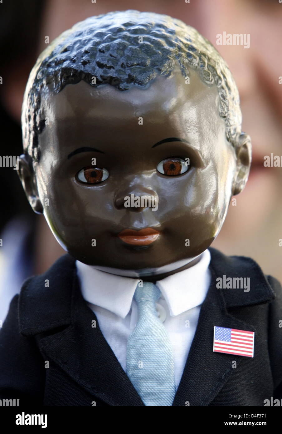 A doll representing US Presidential Candidate Barack Obama is held by ...