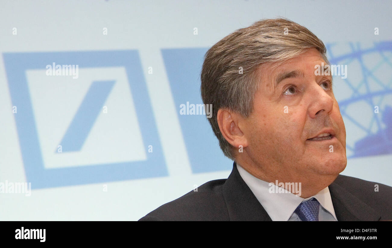 Deutsche-Bank CEO Josef Ackermann seen in front of a screen reading ...