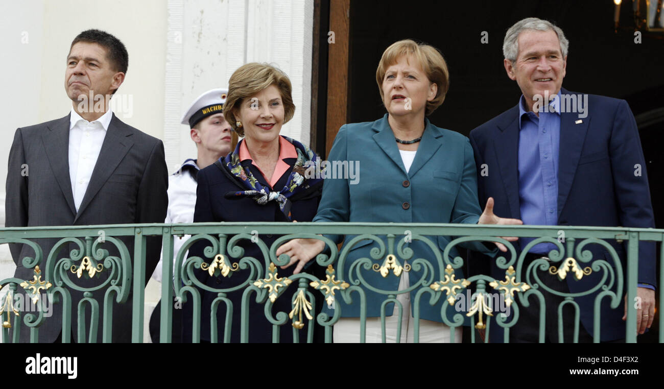 German Chancellor Angela Merkel (2-R), her husband Joachim Sauer (L ...