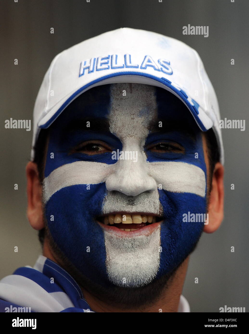 A Greek Fan smiles prior to the EURO 2008 preliminary round group D ...