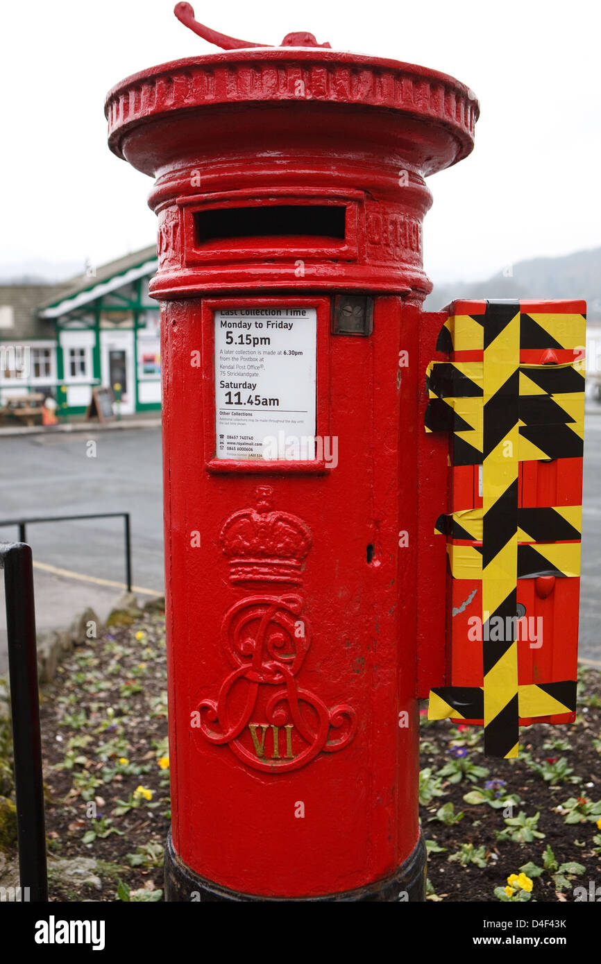 A red letterbox in Ambleside in the Lake District Stock Photo - Alamy