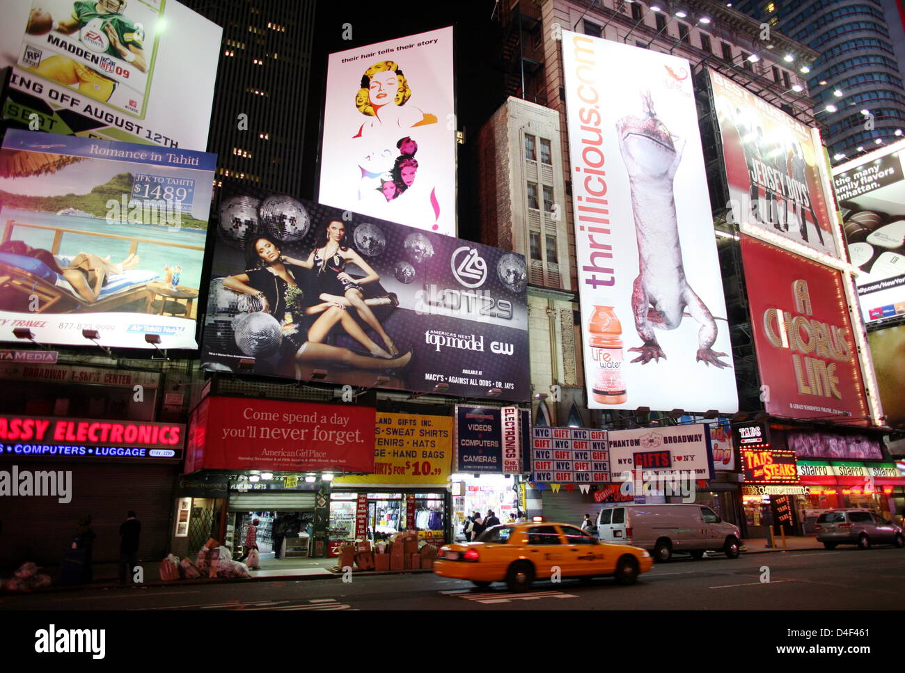 The picture shows huge advertising boards at Times Square in Manhattan ...