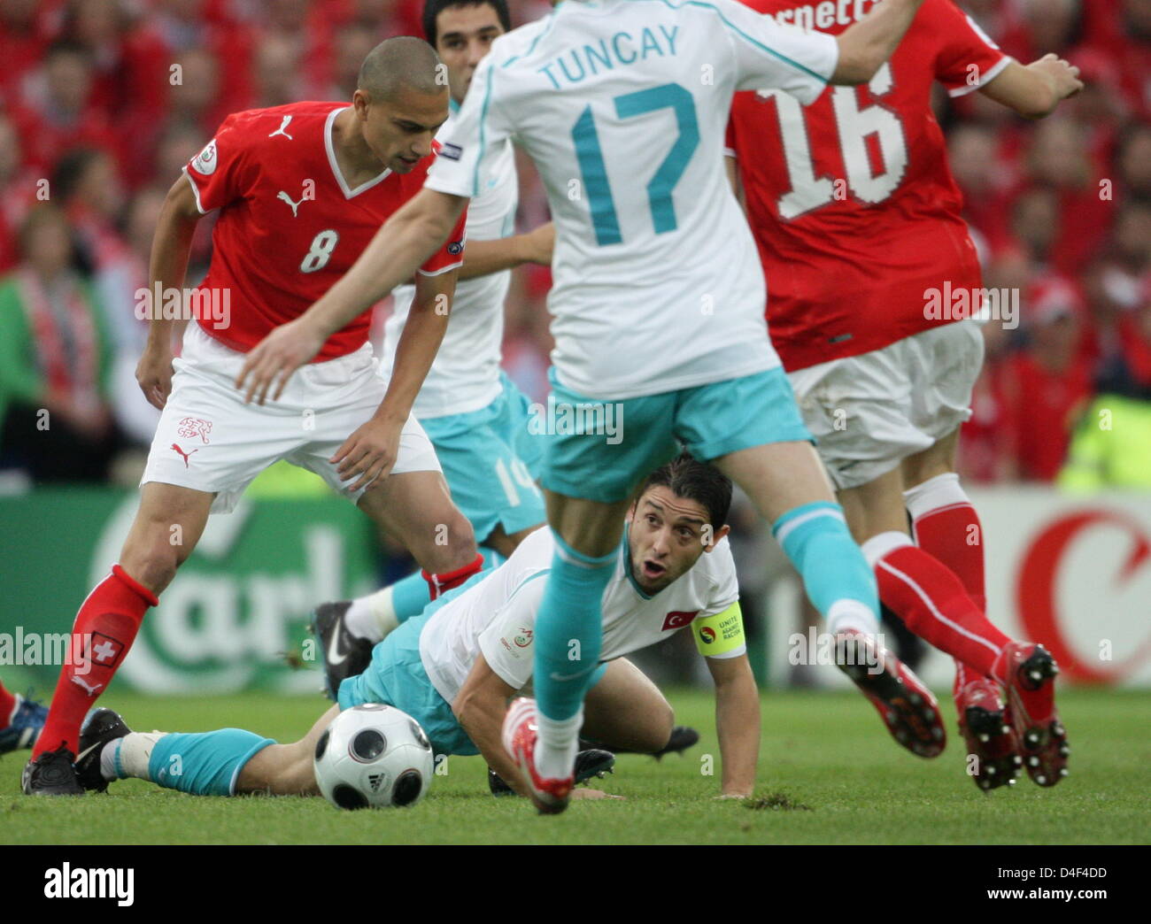 Goekhan Inler (L) of Switzerland vies with Nihat Kahveci (C) of Turkey ...