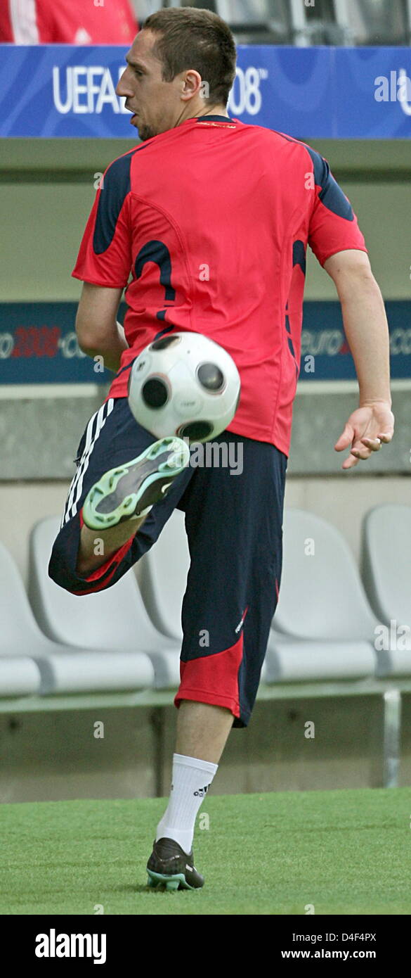 French national team player Franck Ribery plays with a ball during the ...