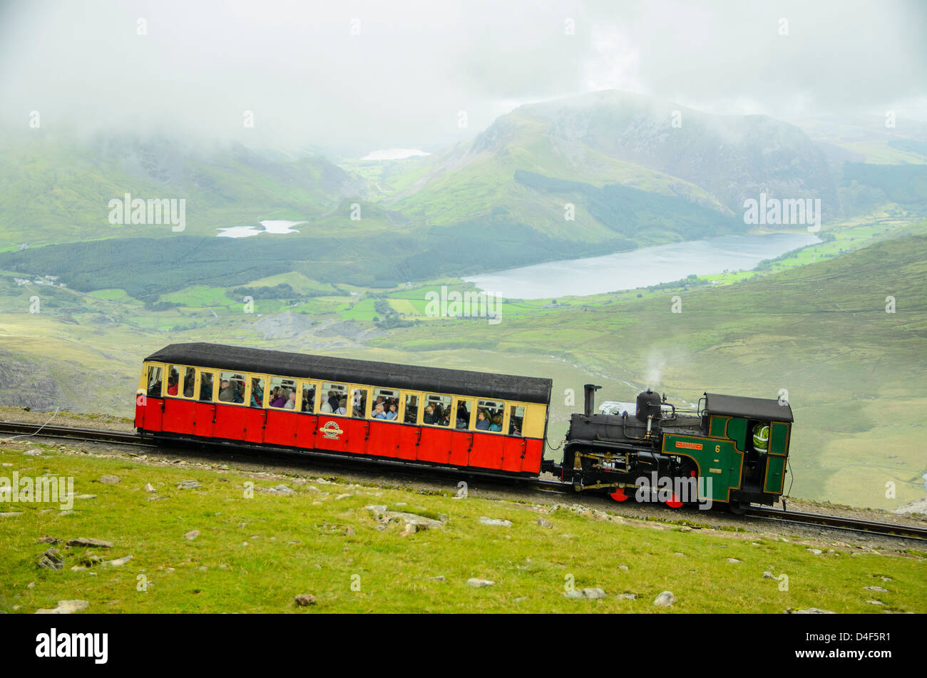 Snowdon Mountain Railway train just below the summit of Snowdon (Yr ...
