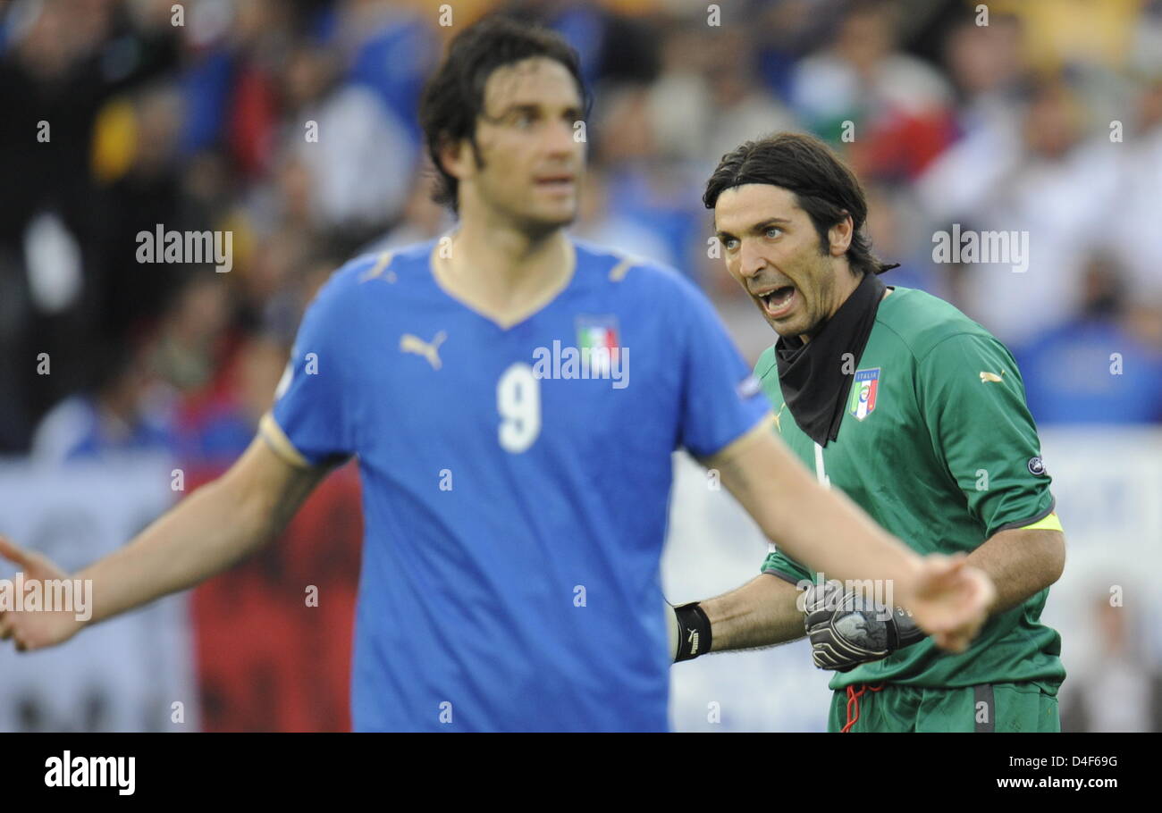 Goalkeeper Gianluigi Buffon (R) and Luca Toni of Italy jubilate after ...