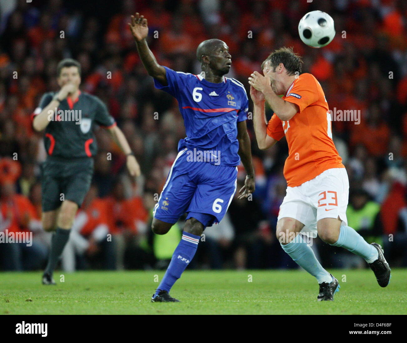 Referee Herbert Fandel (L) of Germay whistles against Claude Makele of ...