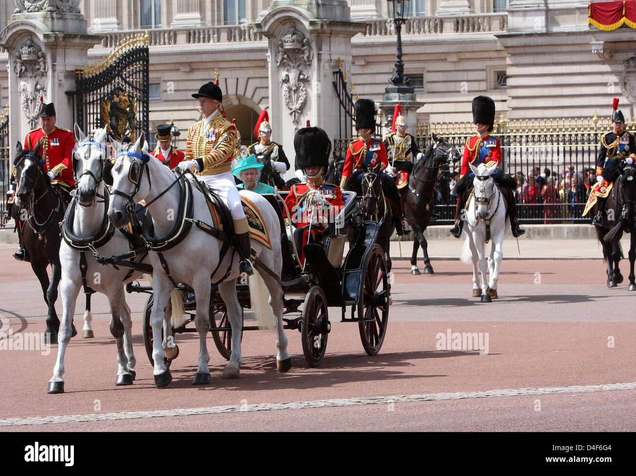Queen Elizabeth II and the Duke of Edinburgh (C) are pictured at the ...