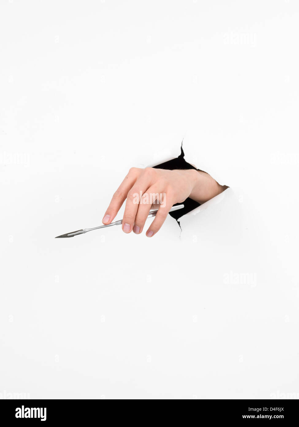Female Hand Holding Knife